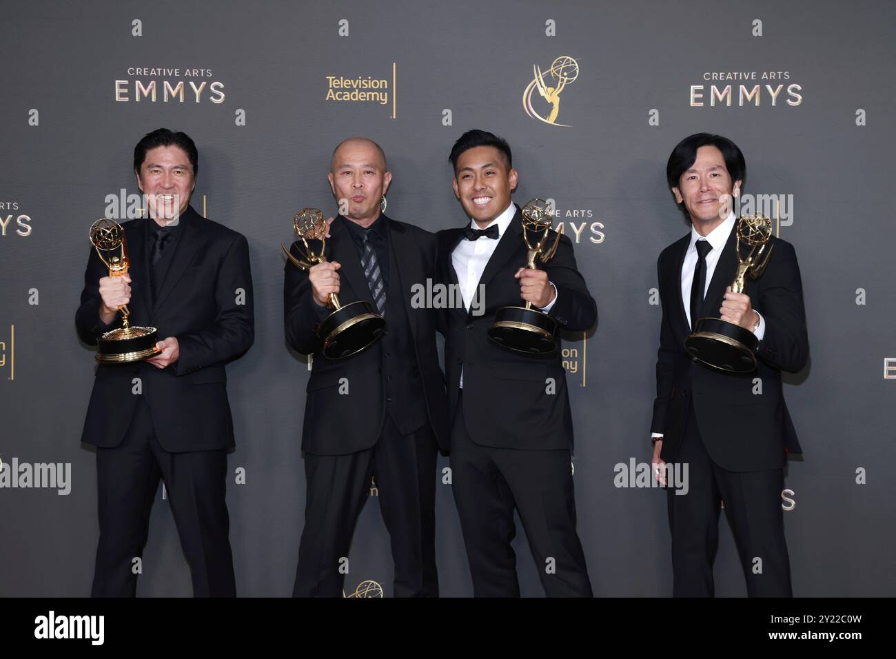 Hiroo Minami, from left, Nobuyuki Obikane, Martin Cochingco, and Johnson Phan pose with their ...