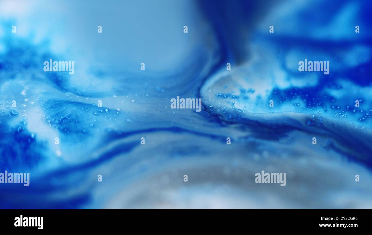 Paint splash. Fluid spill. Defocused blue color grain texture acrylic ...