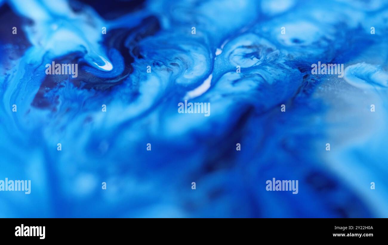 Ink drip. Fluid art. Blur blue color glowing acrylic varnish spatter ...