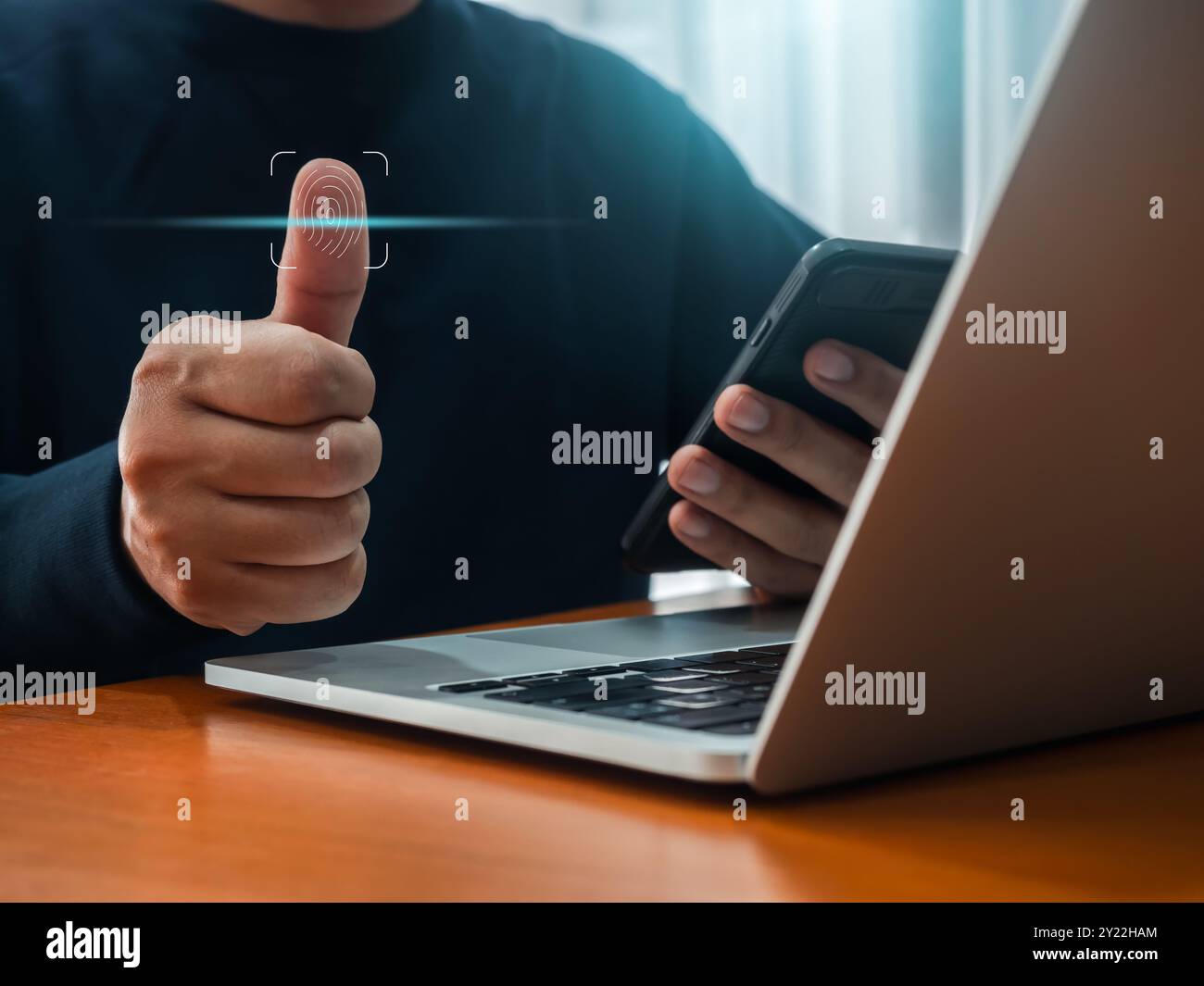 Fingerprint scan icon on virtual screen while businessperson finger ...