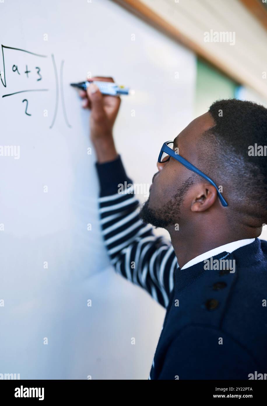 University, class and teacher writing on whiteboard for math lesson ...