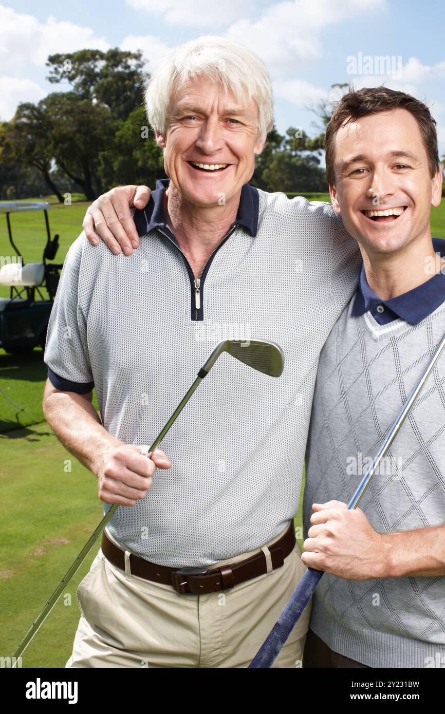 Portrait, golf course and father with son, club and hug with fitness ...