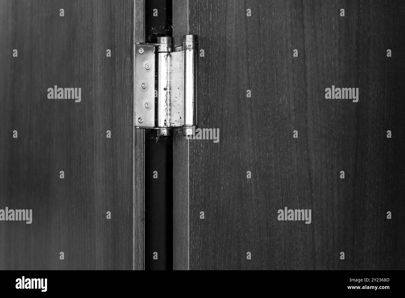 Metal Hinge on an Open Door: Wooden Background and Minimalism in ...