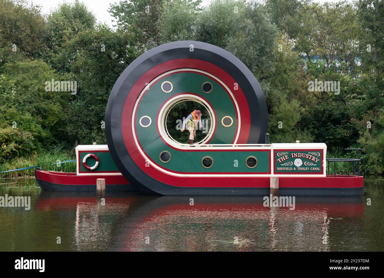 Artist Alex Chinneck with his sculpture of a canal boat after being ...