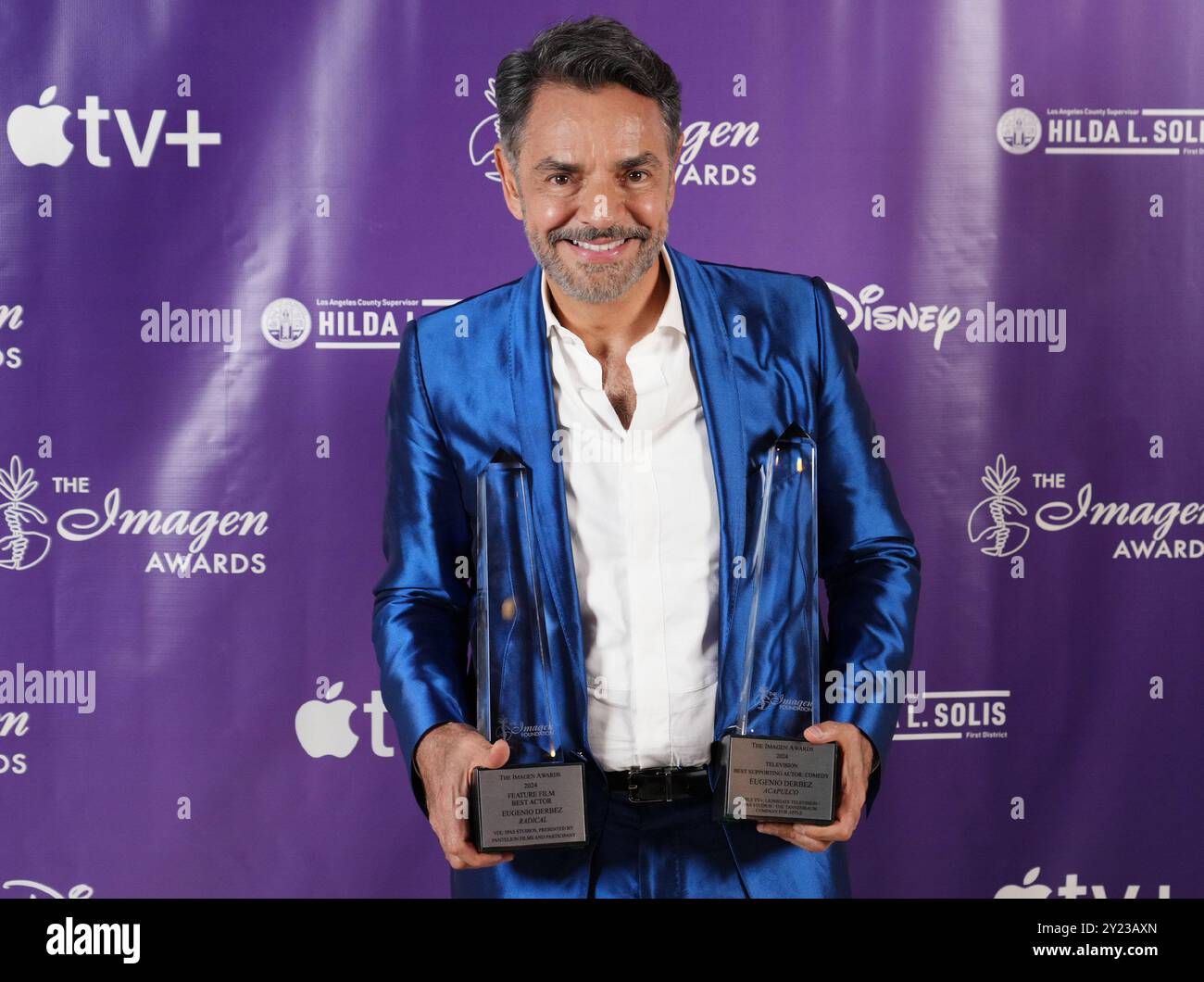 Eugenio Derbez pose with his two awards at the The 39th Annual Imagen ...