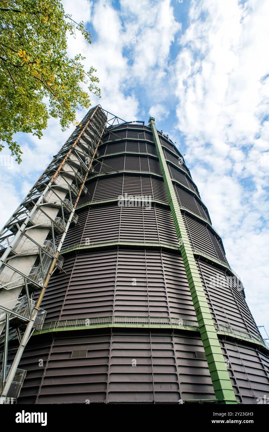 Gasometer building in Oberhausen. Tall tower with an external staircase ...