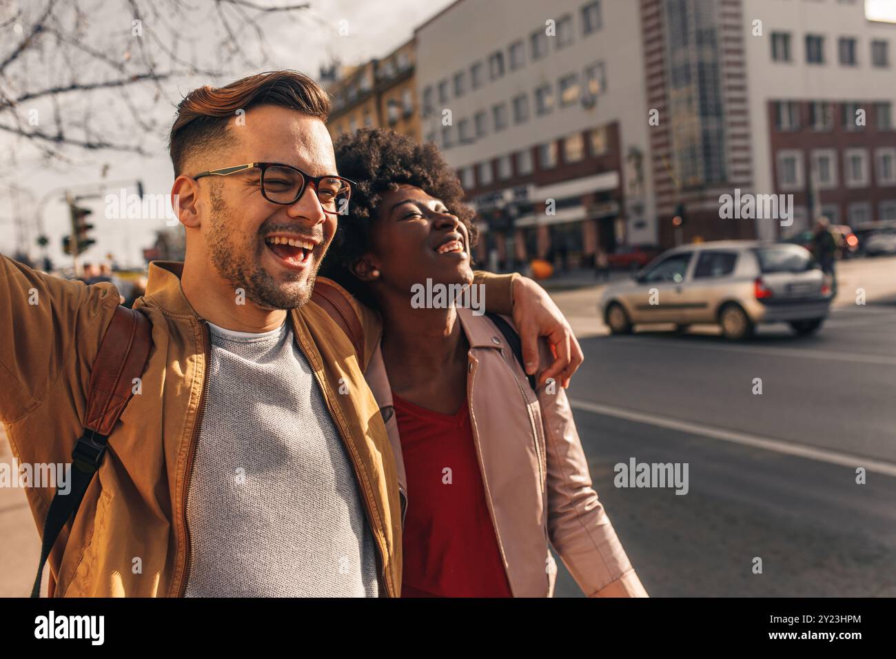 Smiling couple enjoying on vacation, young tourist having fun walking ...