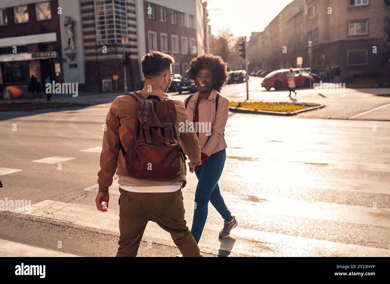 Smiling couple enjoying on vacation, young tourist having fun walking ...