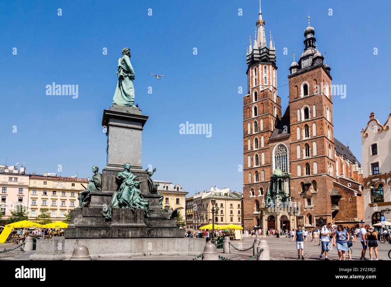 Adam Mickiewicz monument, 1898. behind the Gothic towers of the ...