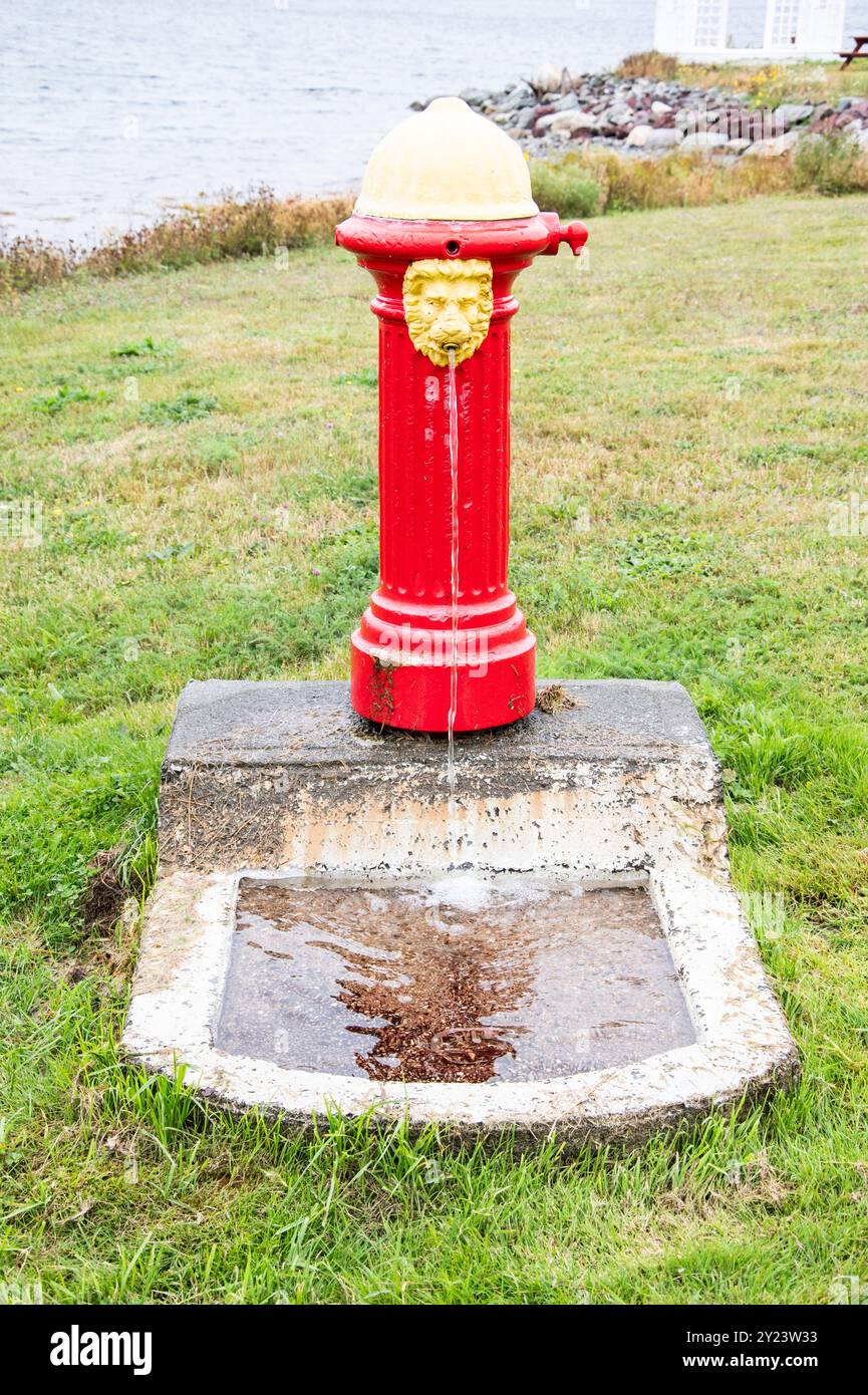 Red fire hydrant water fountain in Heart's Content, Newfoundland ...