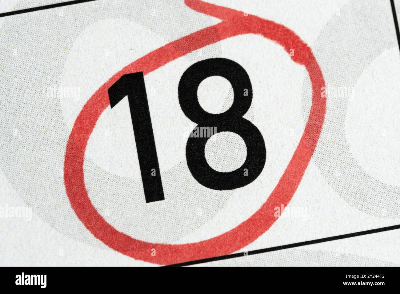 Eighteen number in calendar is circled with red marker Stock Photo - Alamy