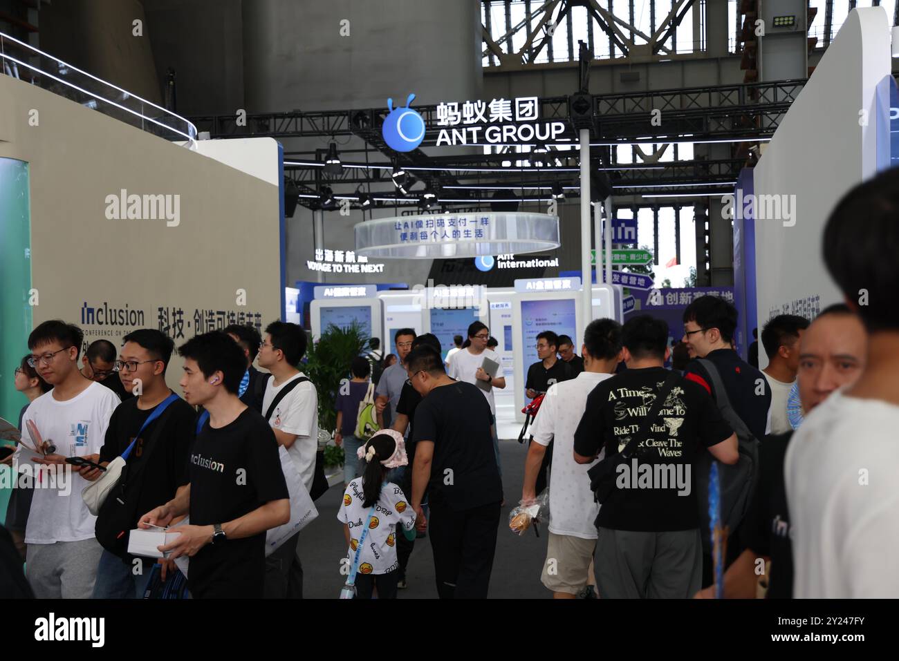 People visit the 2024 Inclusion Conference on the Bund in Shanghai ...