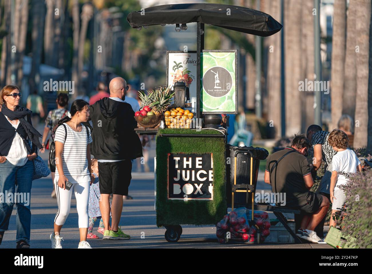 Limassol, Cyprus - October 21, 2021: People buying fresh squeezed juice ...