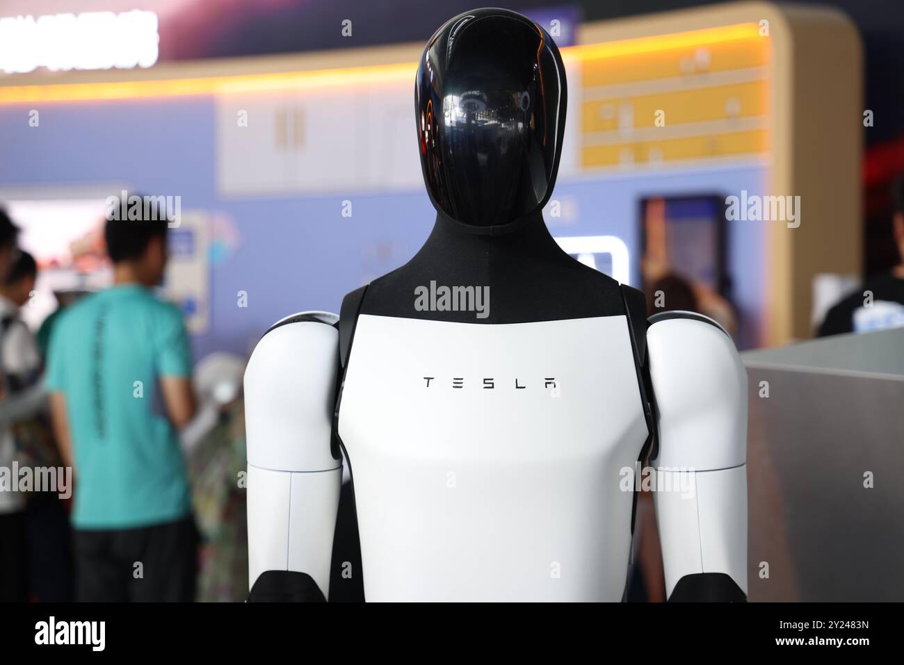 Tesla's latest humanoid robot Optimus makes debut at the 2024 Inclusion ...