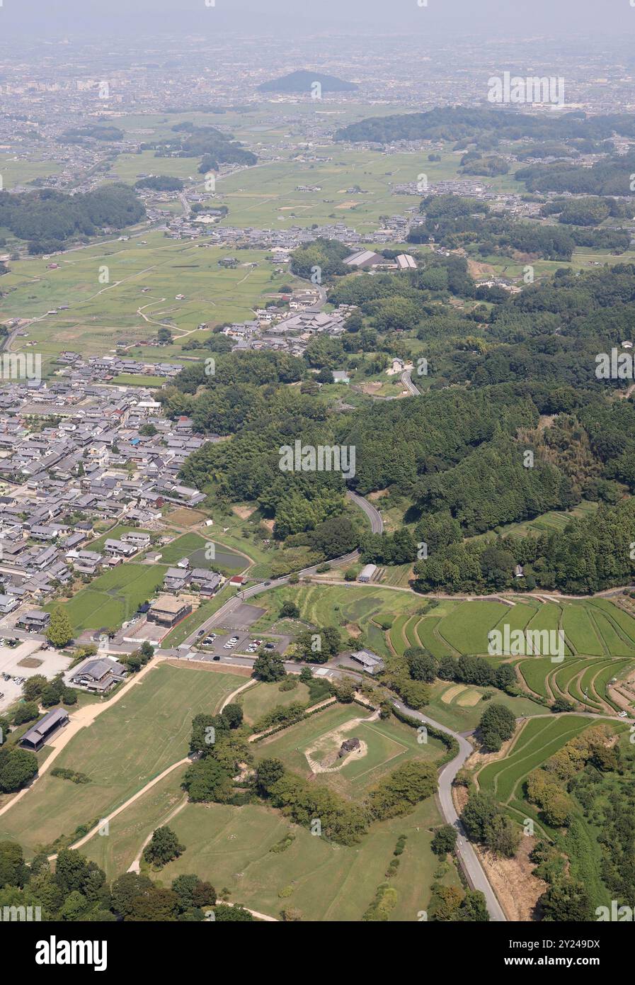 An aerial photo shows remains which comprises "Asuka-Fujiwara ...