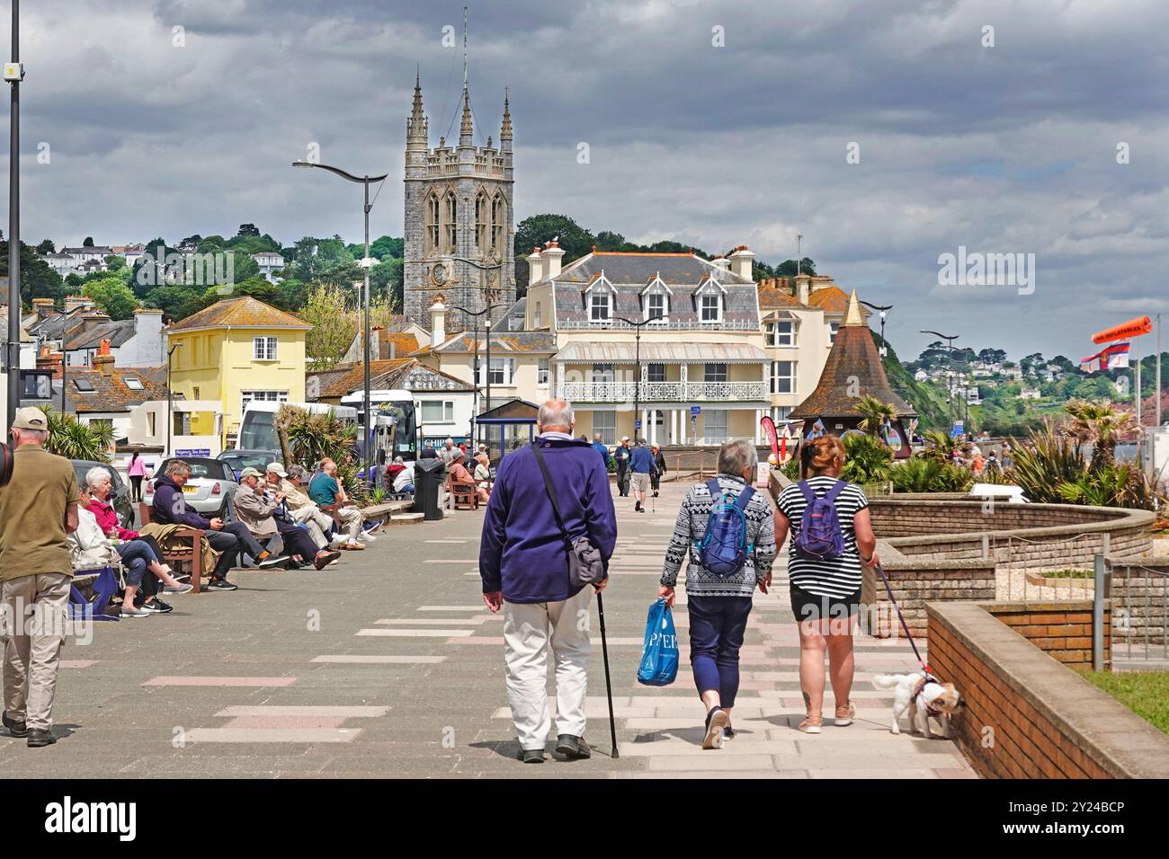 Teignmouth seaside resort wide promenade long row of popular seats back ...