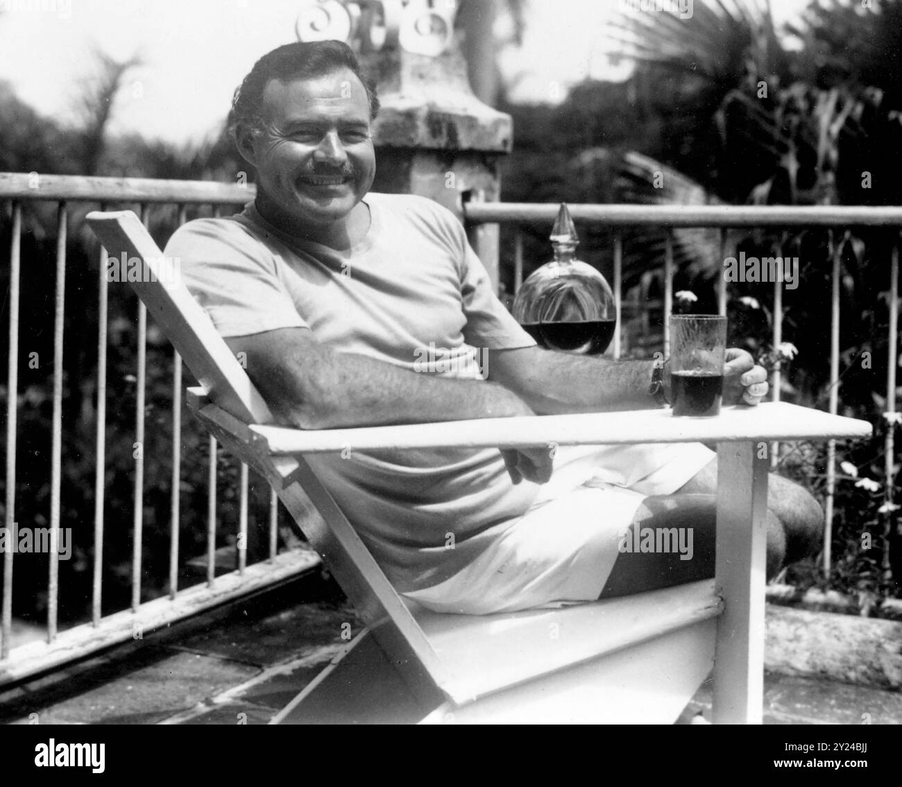 Ernest Hemingway relaxing with a drink at the Finca Vigia, Cuba 1946 ...