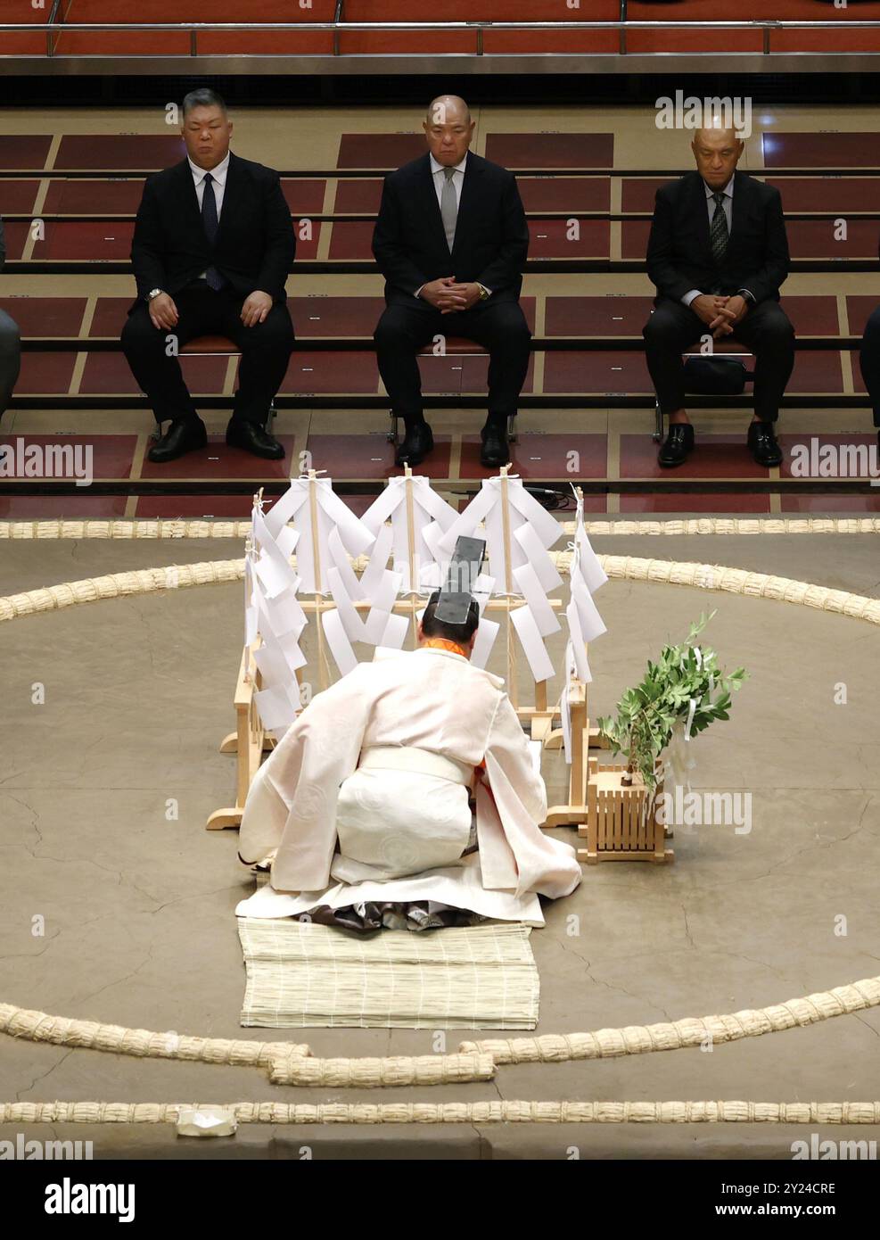 Japan Sumo Association head Hakkaku (back, C) attends a ritual at Tokyo ...