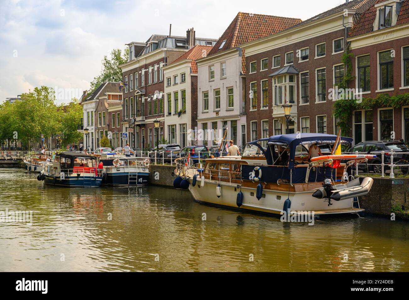 Boats moored on the River Vecht, Utrecht, The Netherlands Stock Photo ...