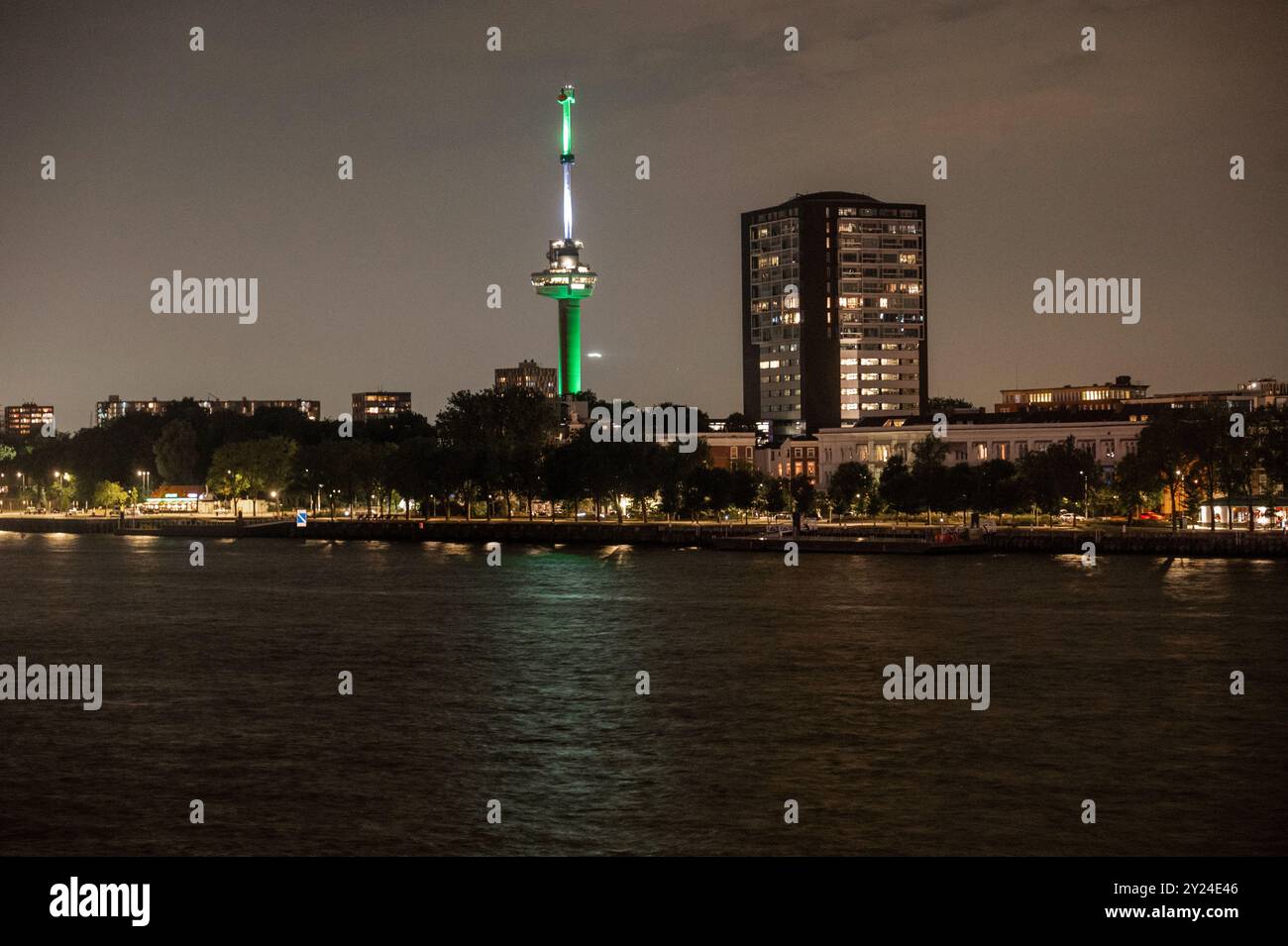 Euromast Rotterdam towers over the city at night, seen across the river ...