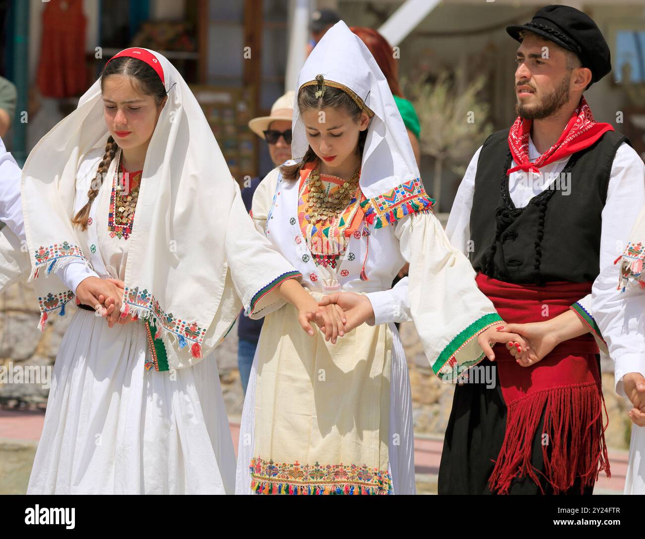 Traditional Greek dancers during the recording of a television ...