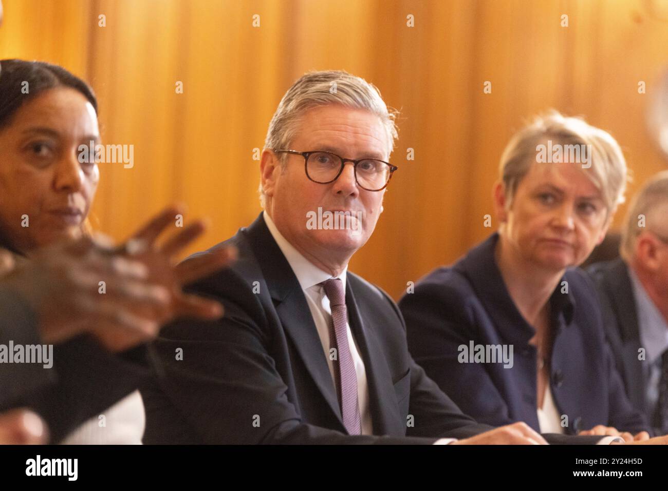 (left to right) Yemi Hughes, whose 19-year-old son Andre Aderemi was ...