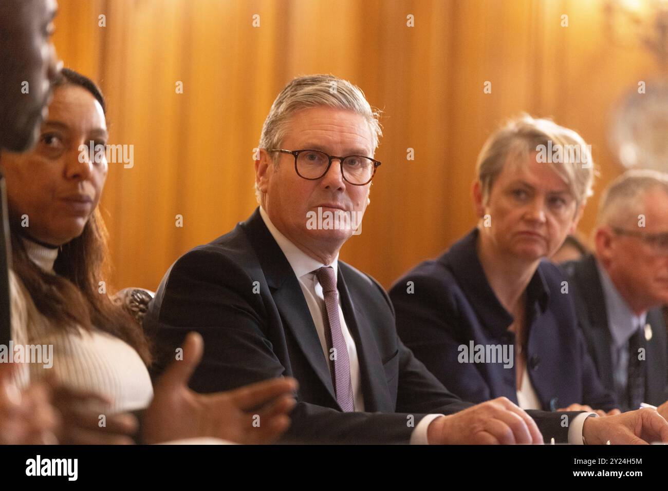 (left to right) Yemi Hughes, whose 19-year-old son Andre Aderemi was ...
