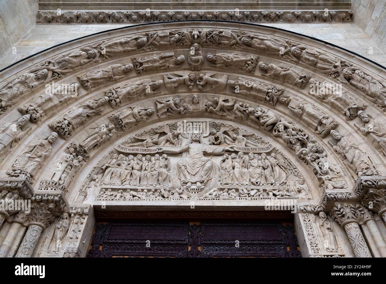 Relief at the entrance to the gothic Saint Denis Basilica in Paris ...