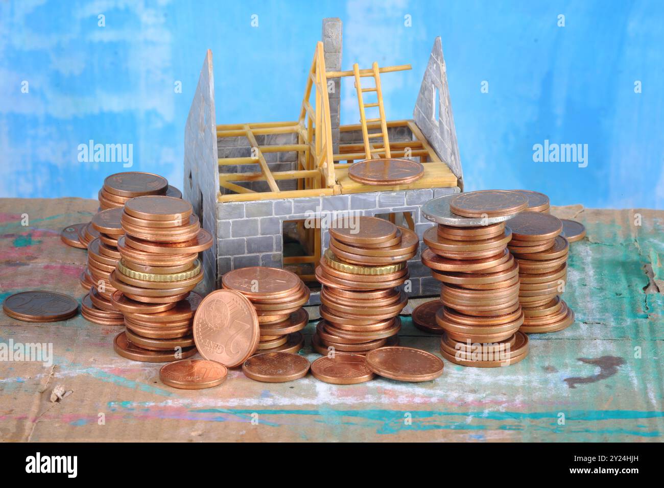 rising costs of building of a house, model house under construction and ...