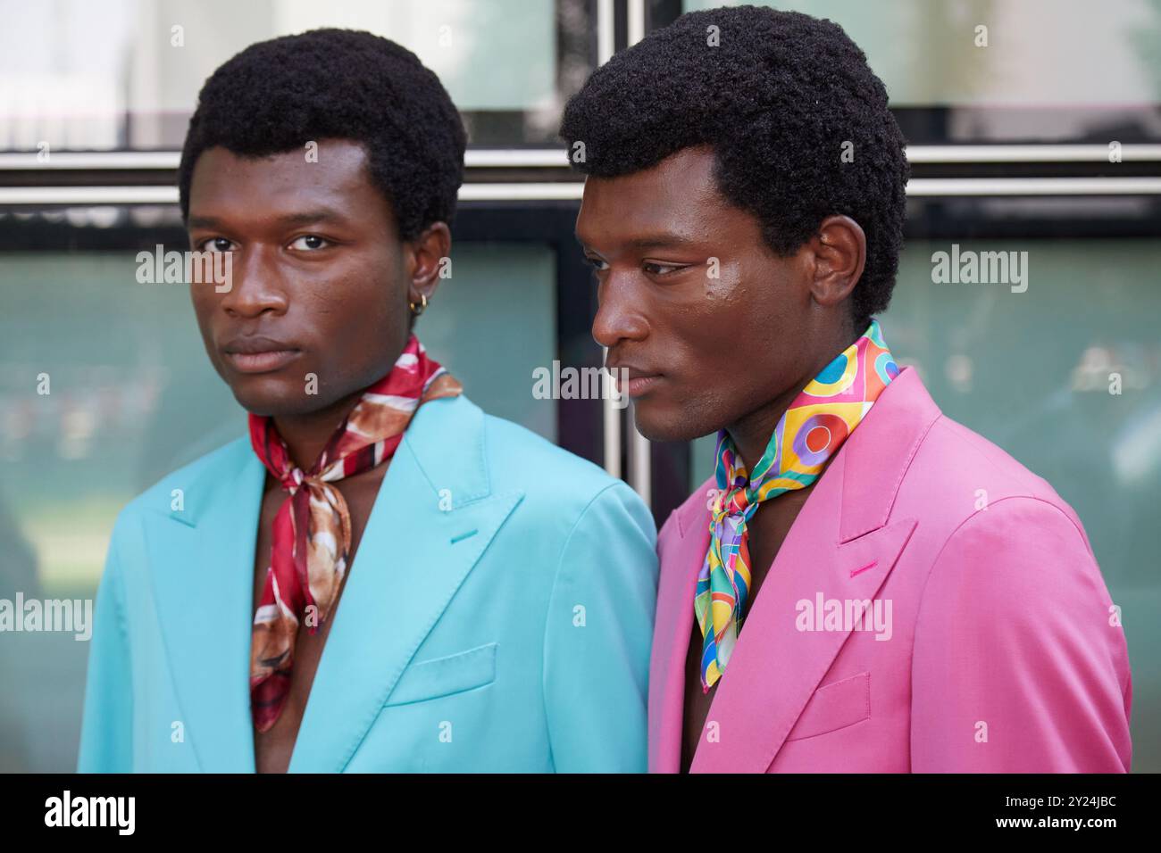MILAN, ITALY - JUNE 17, 2024: Men with turquoise and pink suit before ...