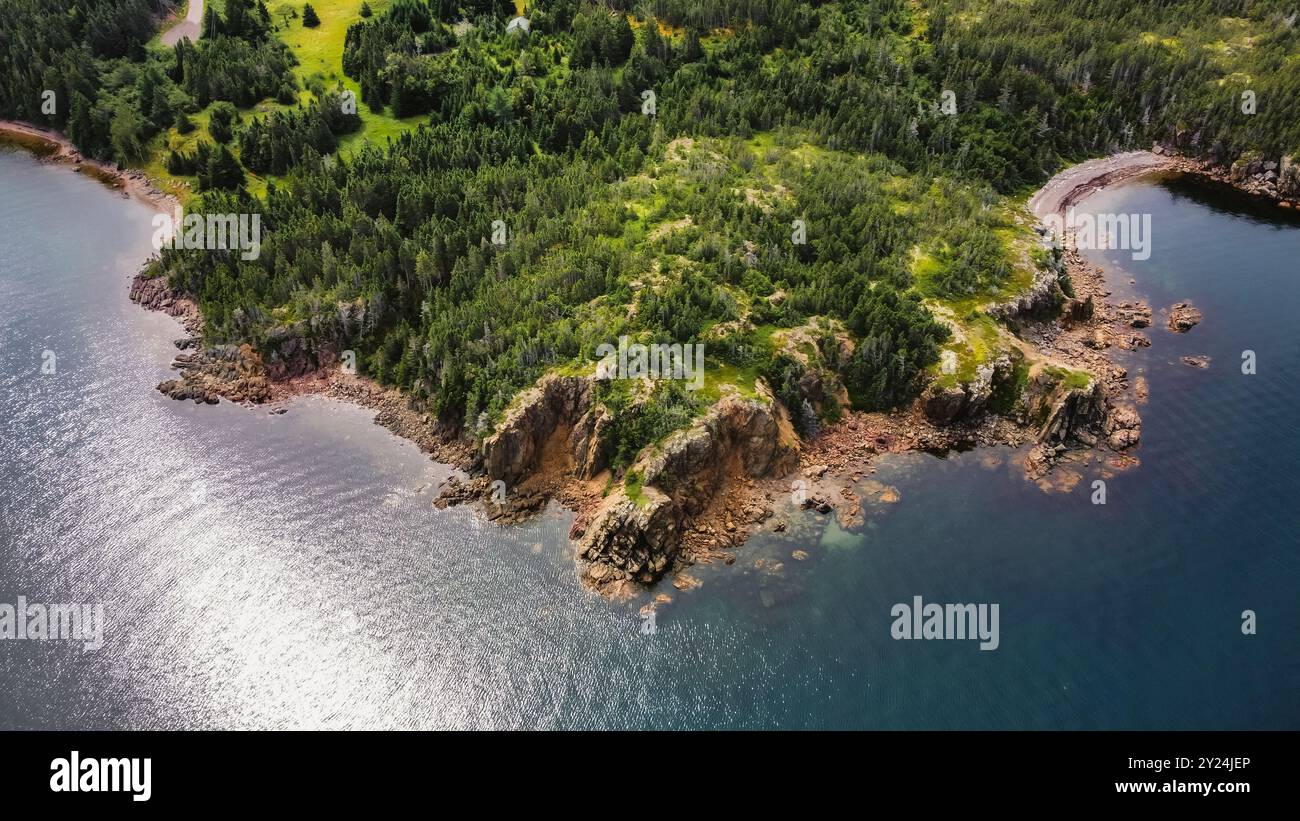 Aerial view of rugged coast of Newfoundland, Canada on edge of ocean ...