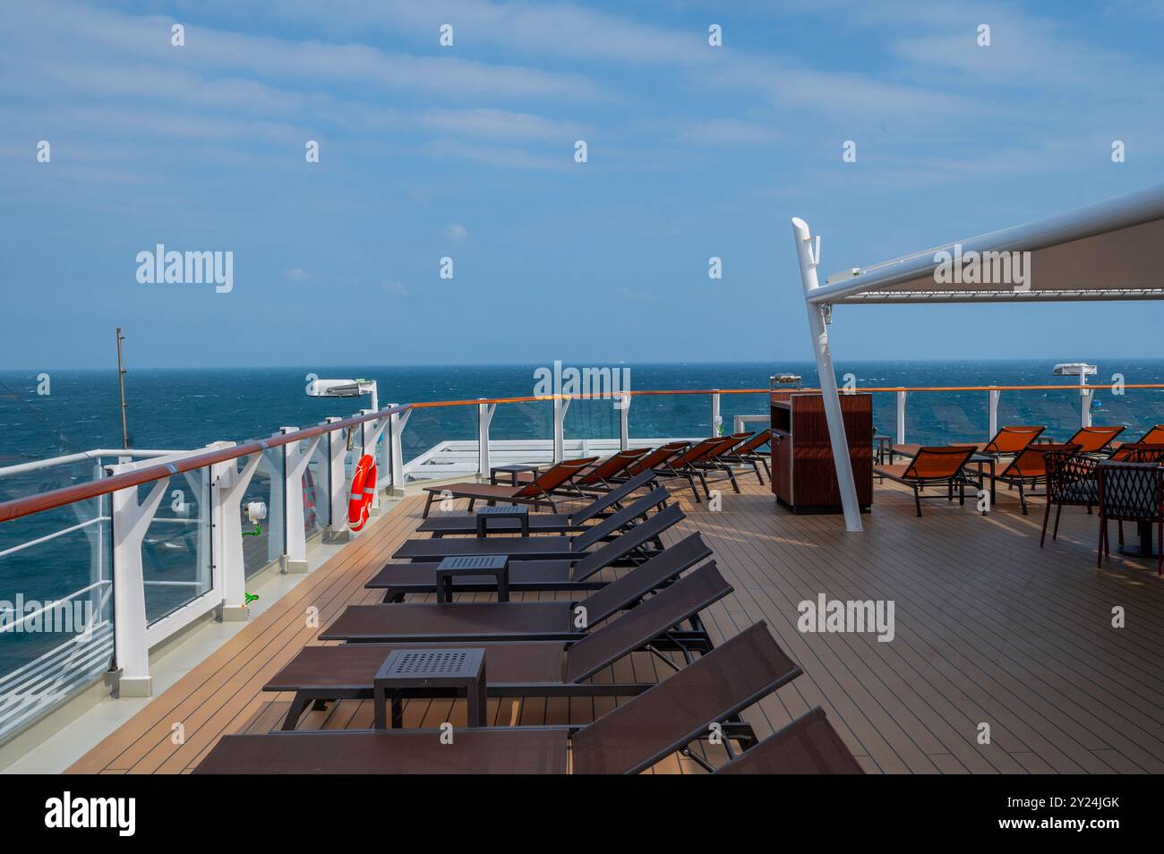 Sun beds and the stern swimming pool on board Cunard's newest cruise ...