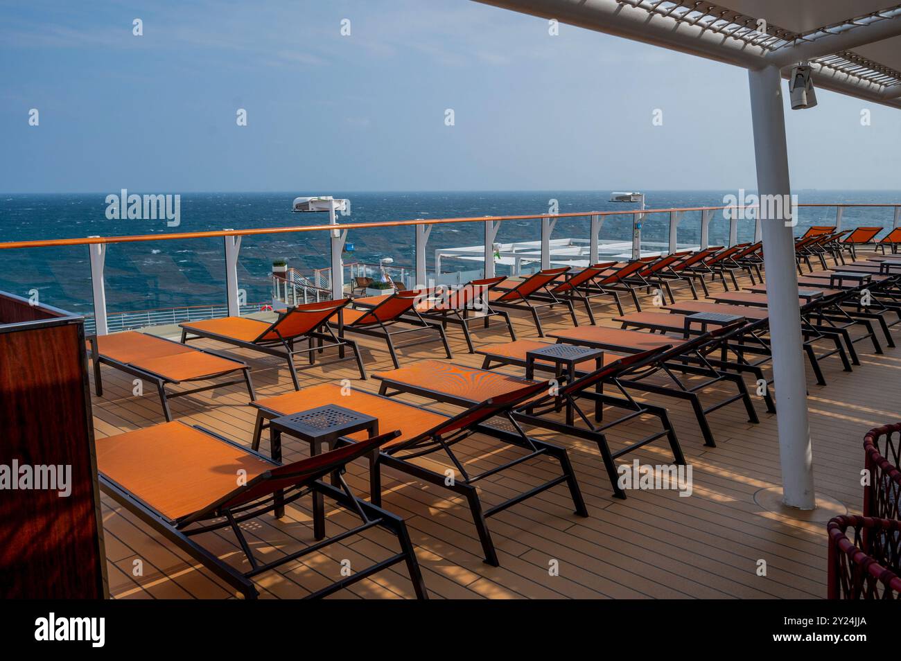 Sun beds and the stern swimming pool on board Cunard's newest cruise ...