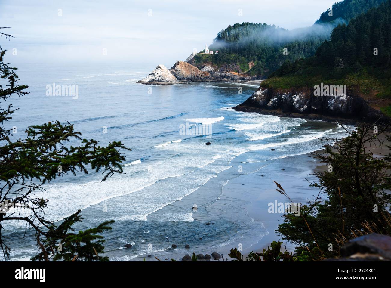 Oregon coast with Heceta Head Lighthouse, cliffs, and waves Stock Photo ...
