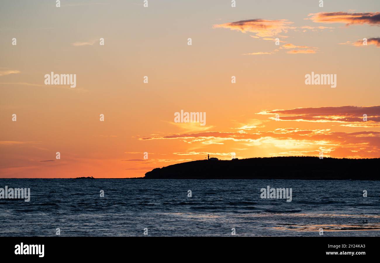 Sunset over point of land of rural town in Newfoundland, Canada Stock Photo - Alamy