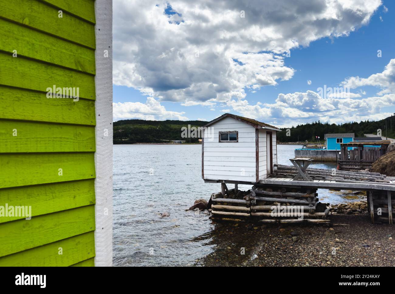 Bright fishing stage buildings at edge of ocean in Newfoundland Stock ...