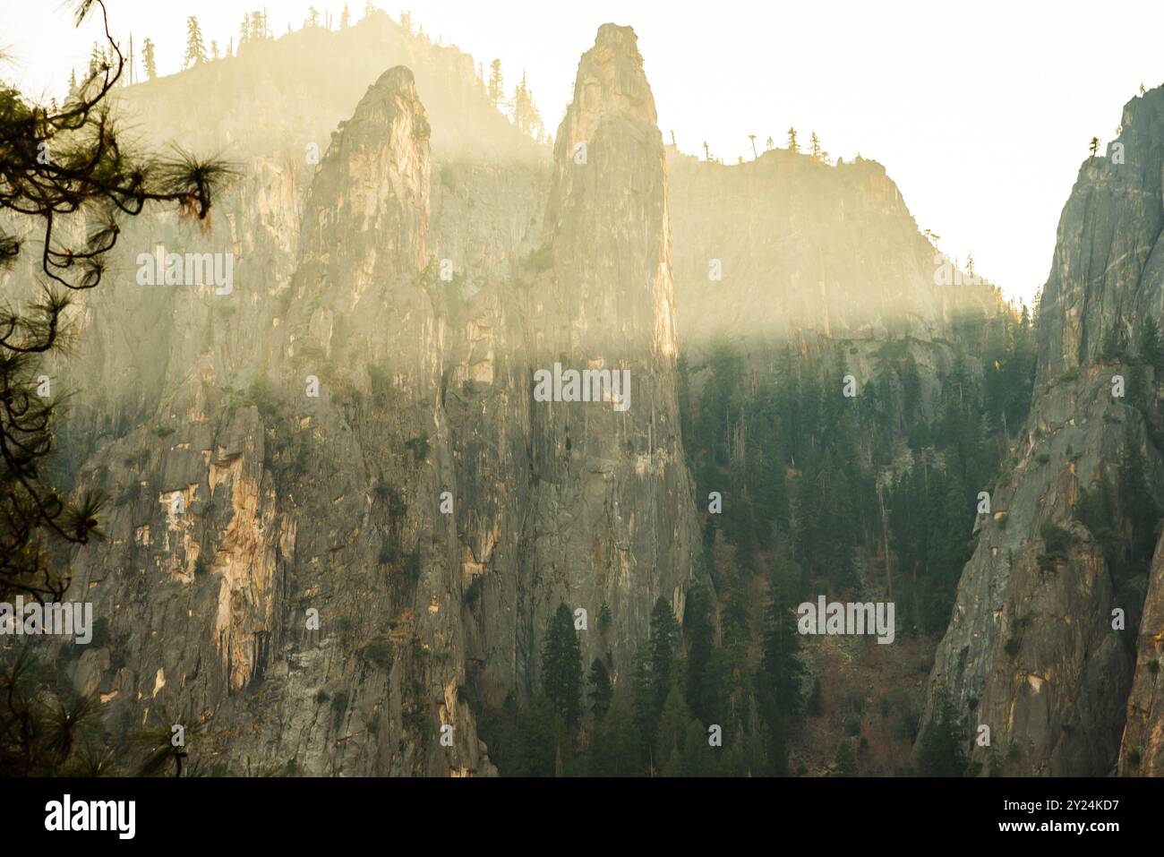 Majestic granite peaks of the Three Brothers in morning mist Stock ...