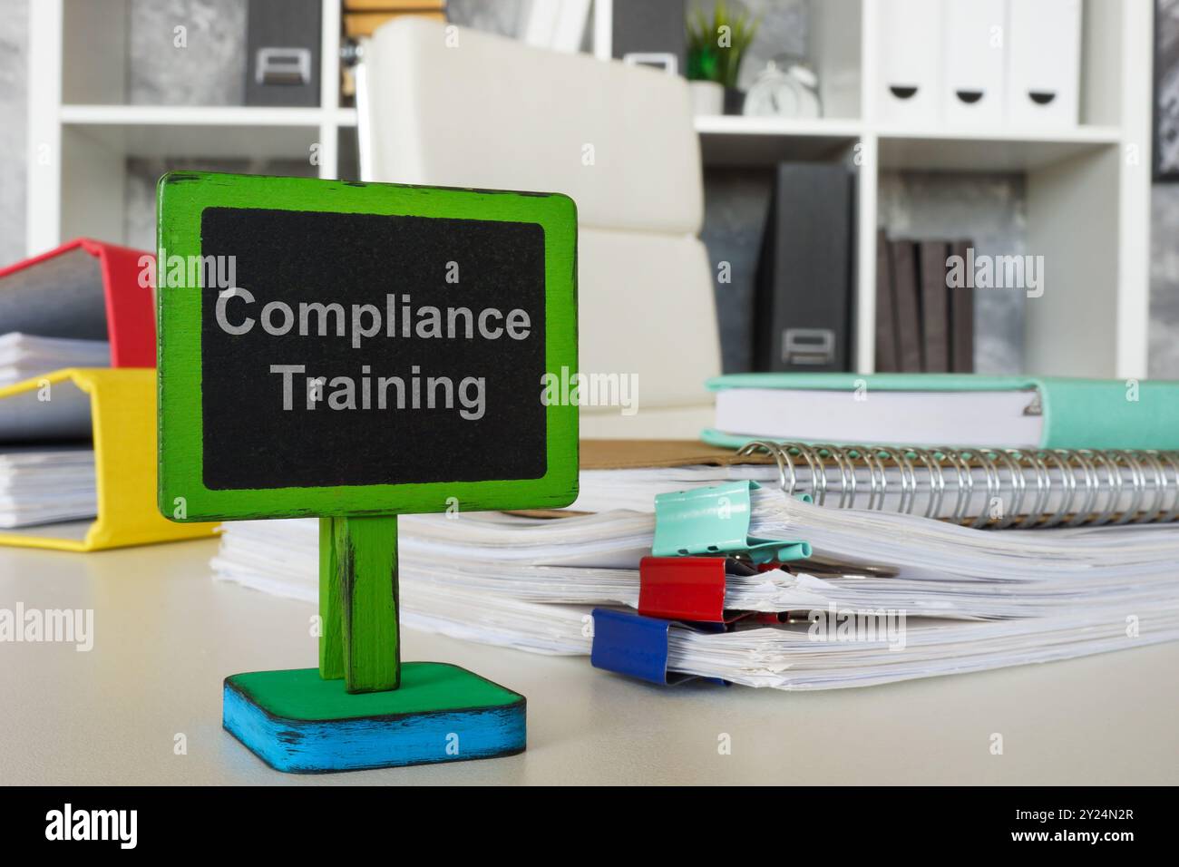 Compliance training sign on office desk. Corporate responsibility ...