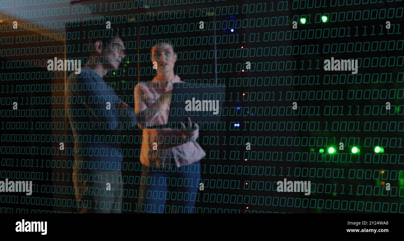 Binary code over people discussing in data center Stock Photo - Alamy