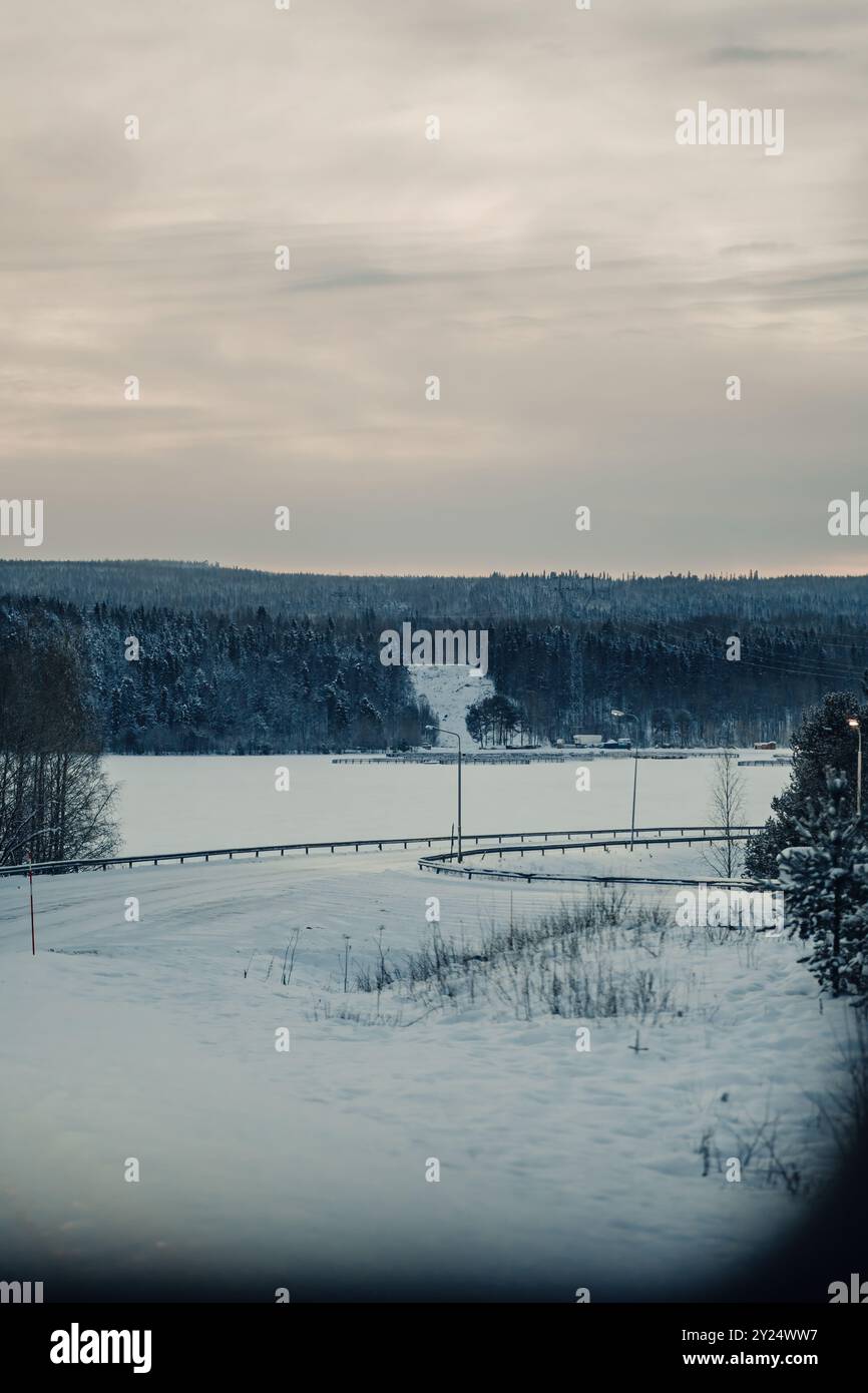 Frozen reservoir in the snowy winter wilderness in Rovaniemi, Lapland ...