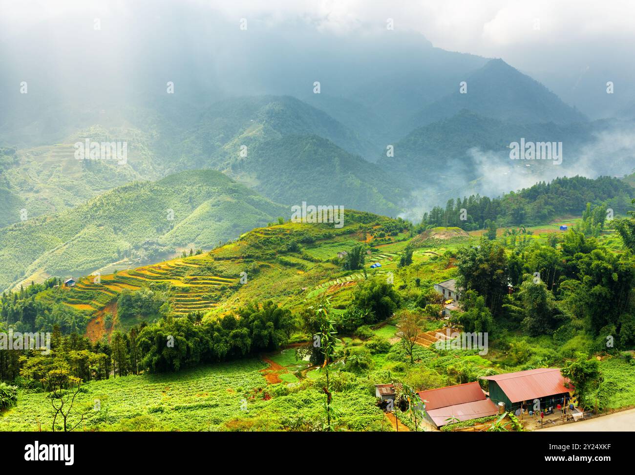 Rice terraces at highlands and rays of sunlight through clouds Stock ...