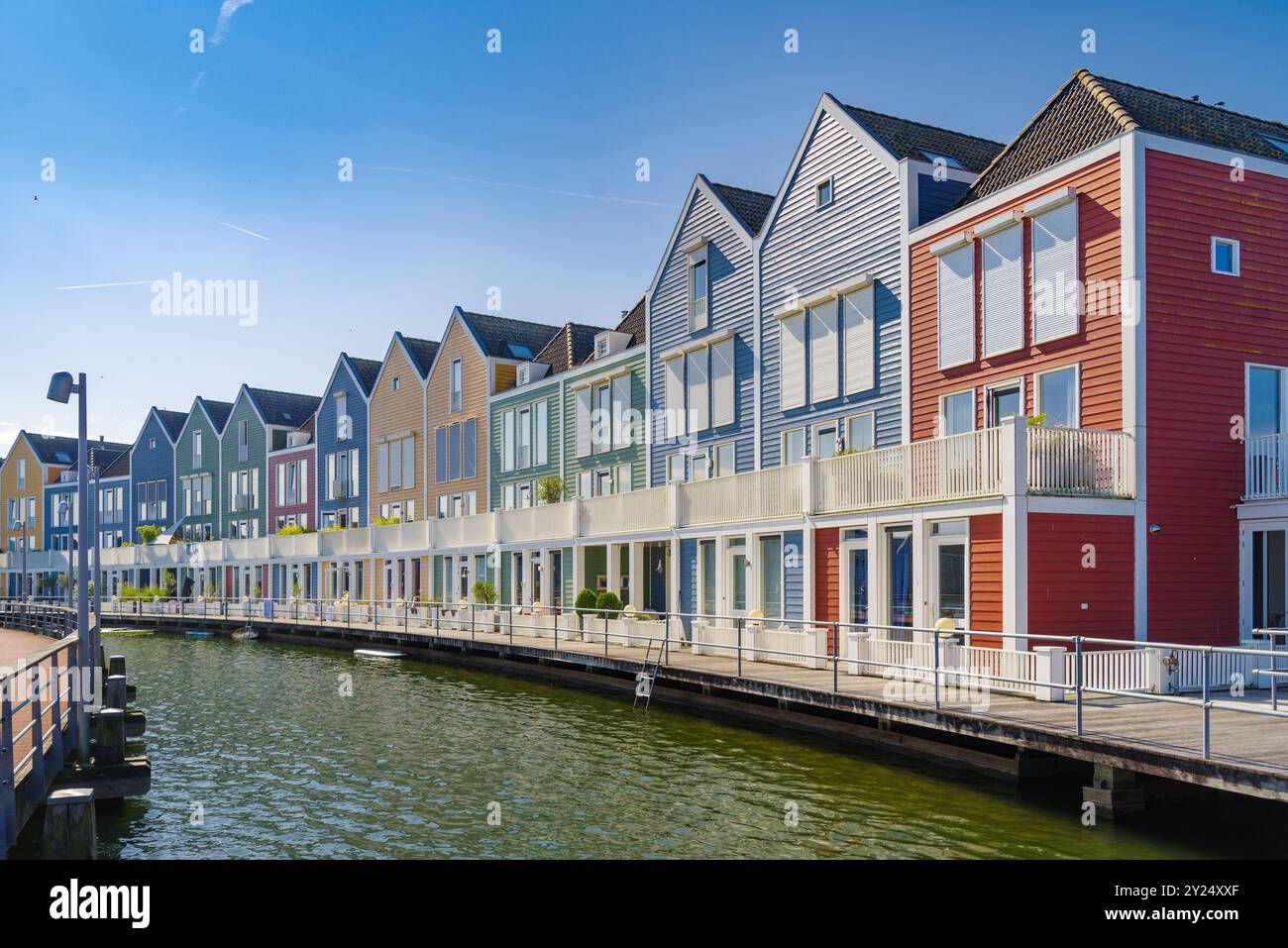 Colorful rainbow houses at a lakeside in Houten, Netherlands Stock ...
