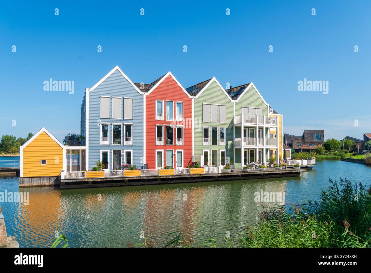 Rainbow houses hi-res stock photography and images - Alamy