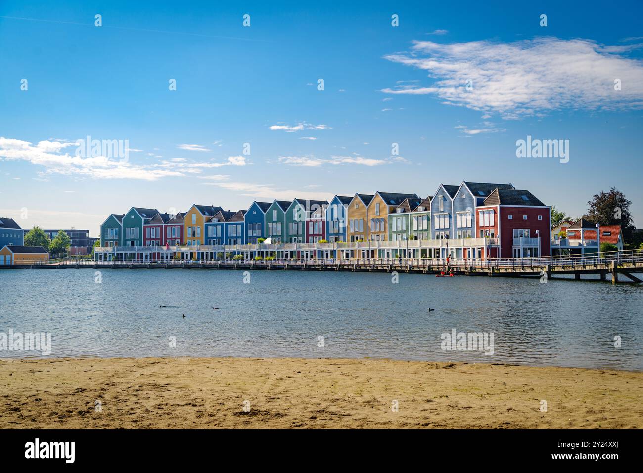 Colorful rainbow houses at a lakeside in Houten, Netherlands Stock ...