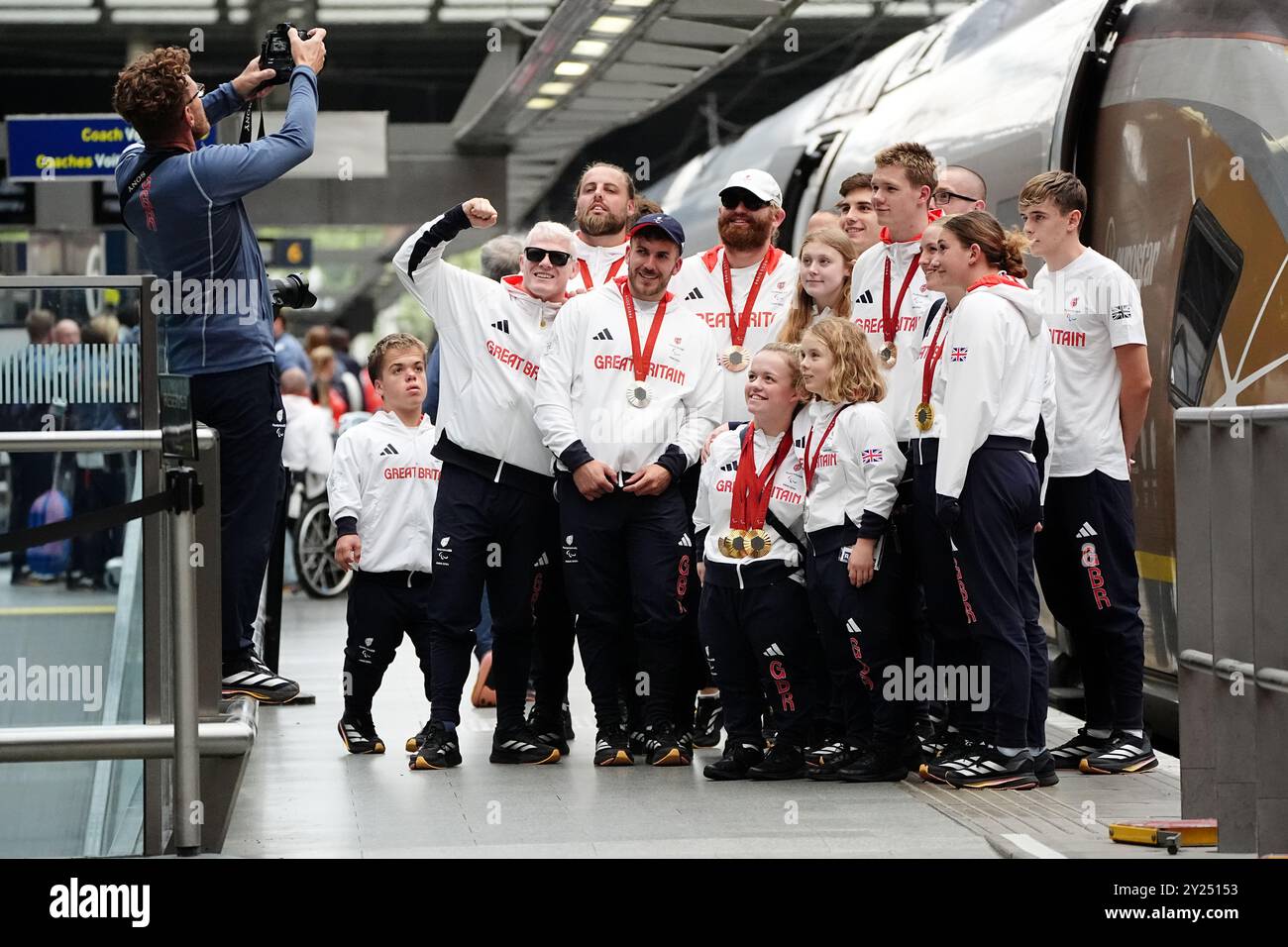 Members of Team ParalympicsGB pose for photographs after arriving by ...