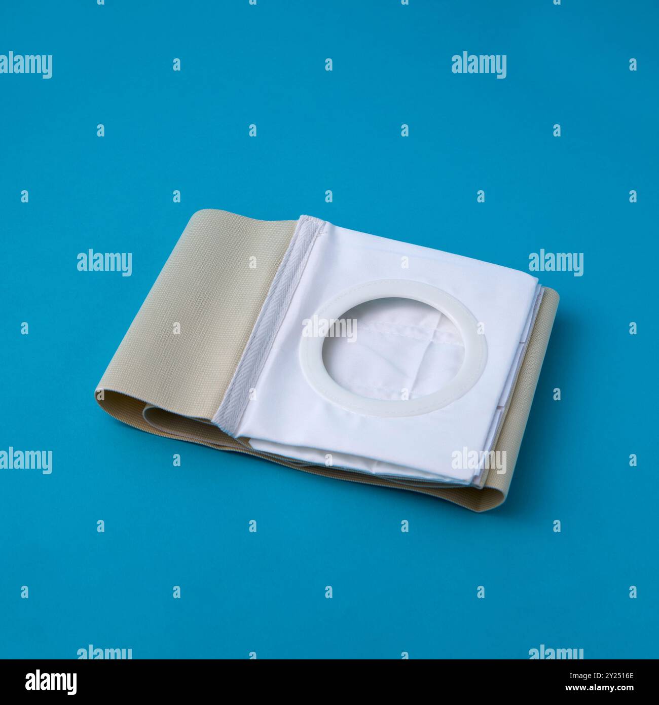 closeup of an abdominal belt, with a stoma opening, for colostomy ...