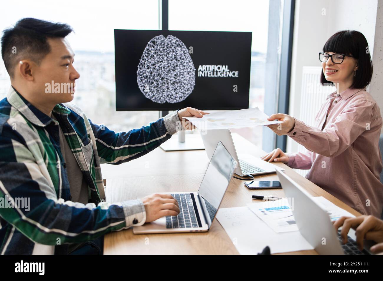 Diverse colleagues collaborating sharing ideas hi-res stock photography and images - Alamy