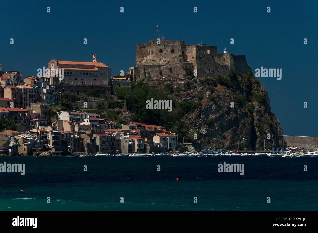 Medieval castle (right), the Castello Ruffo di Calabria, and town of ...