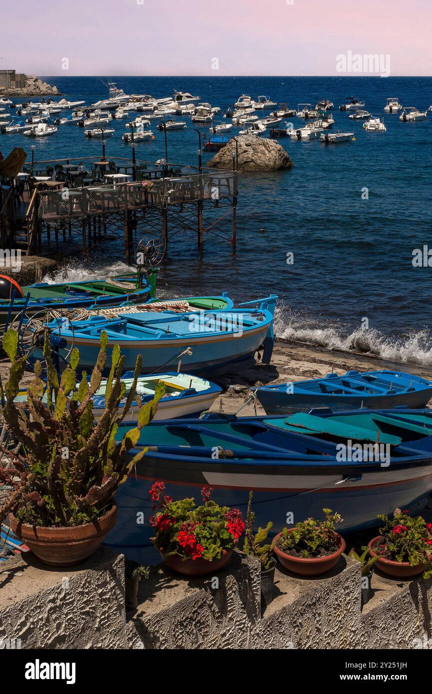 In-shore fishing boats and restaurant at Scilla, a town in Calabria ...