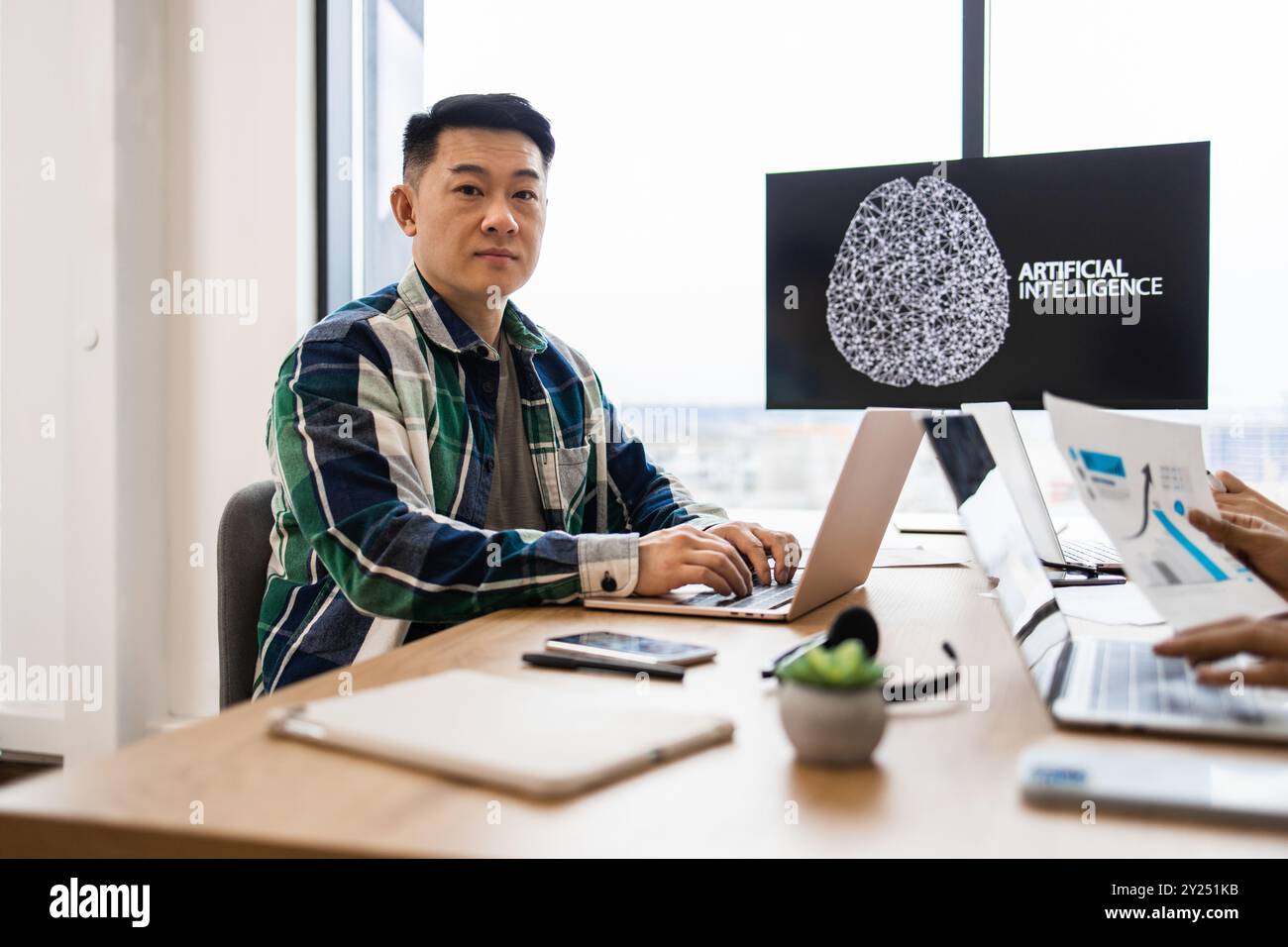 IT expert working on development of artificial intelligence project ...